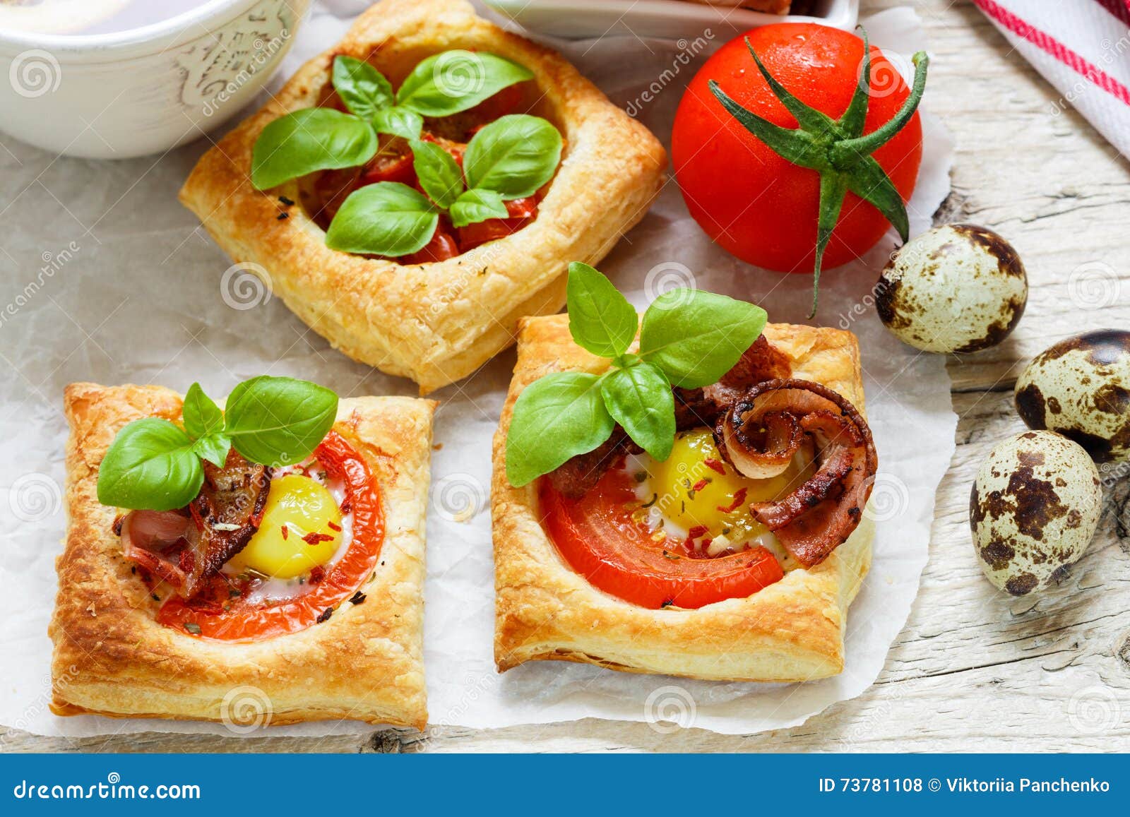 Open Pies of Puff Pastry with Quail Egg, Tomatoes, Bacon and Basil ...