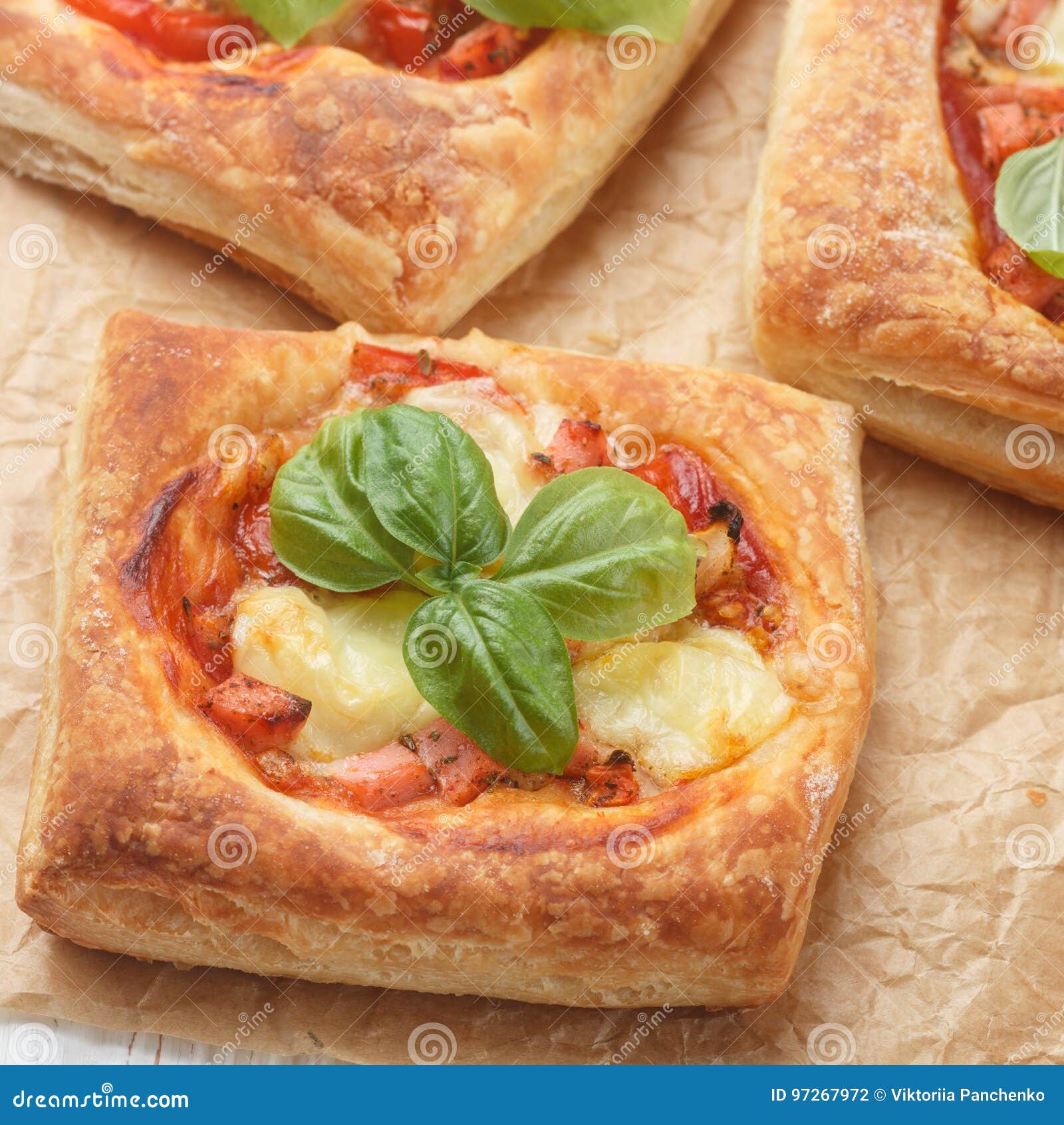 Open Pies Puff Pastry with Tomato, Mozzarella, Onion and Basil Stock ...