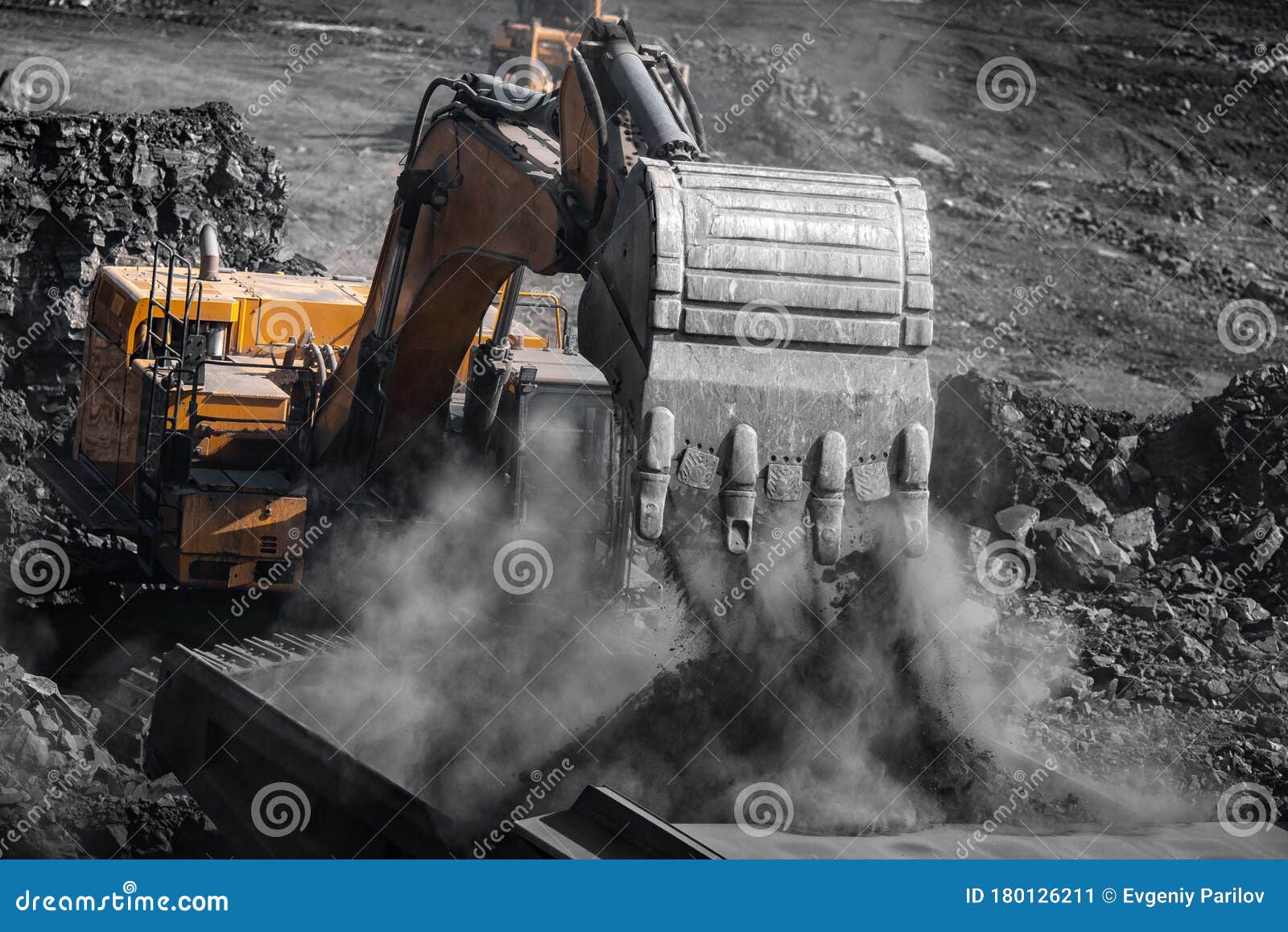 Open Pit Mine Industry. Excavator Work Loading of Coal into Yellow ...