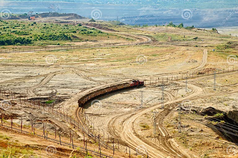 Open-pit Mine, Mining Train Carrying Excavated Materials. Mining ...
