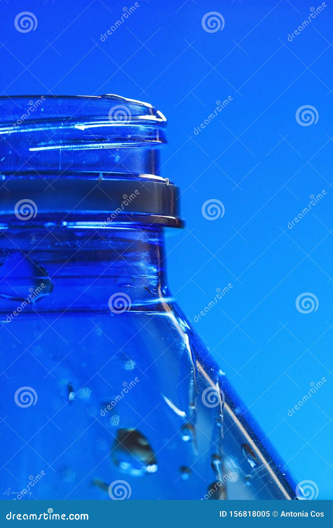 Empty Blue Plastic Bottle with Blue Background Stock Image - Image of ...