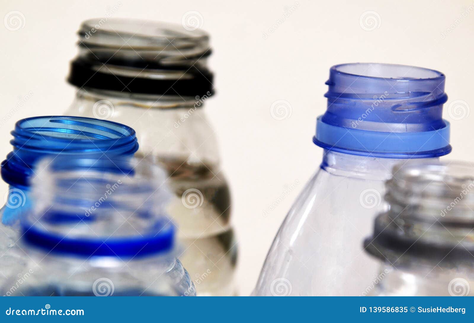 Open plastic bottles stock image. Image of production - 139586835