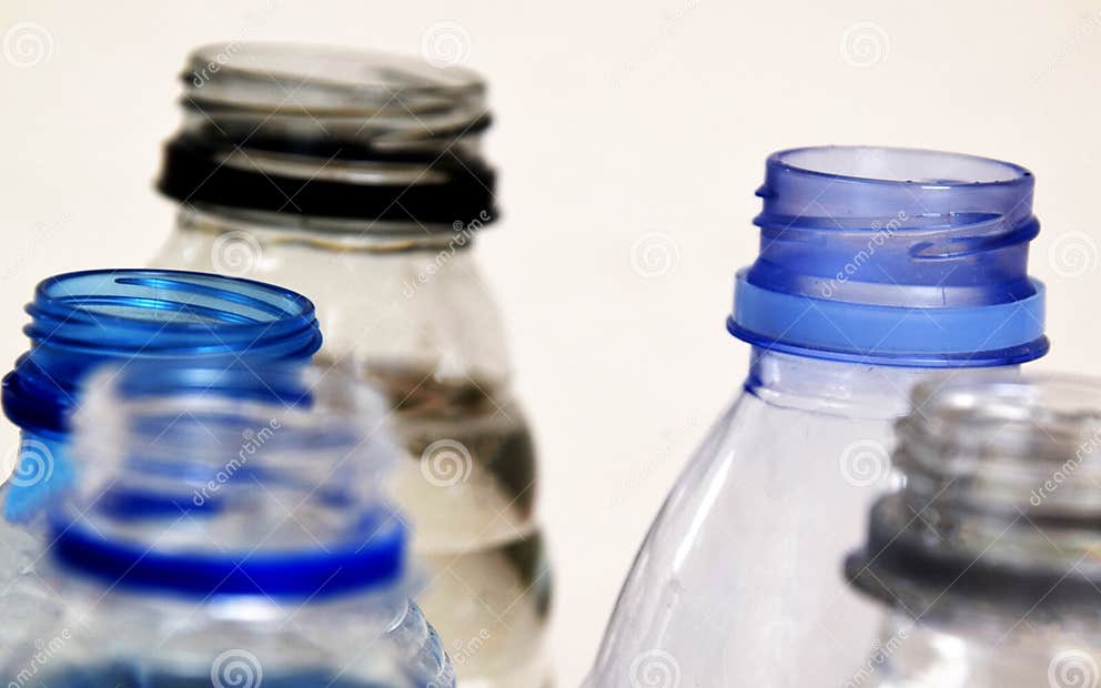 Open plastic bottles stock image. Image of production - 139586835