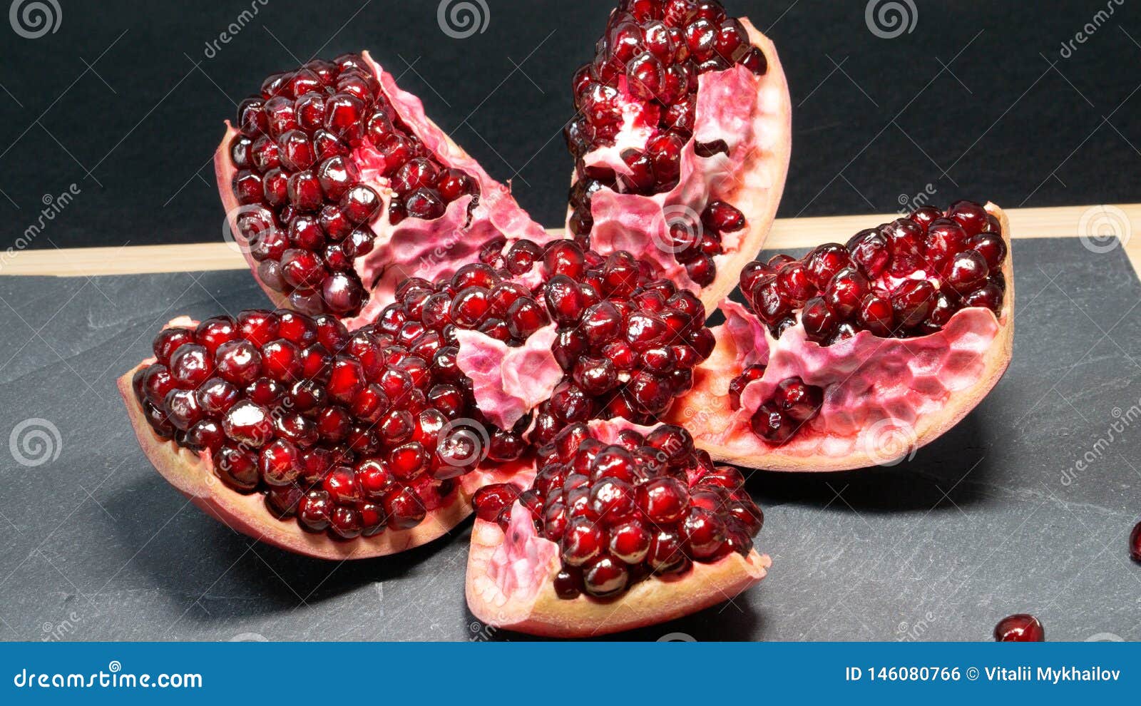 The Open Pomegranate Fruit, in Which the Grains are Visible Stock Photo ...