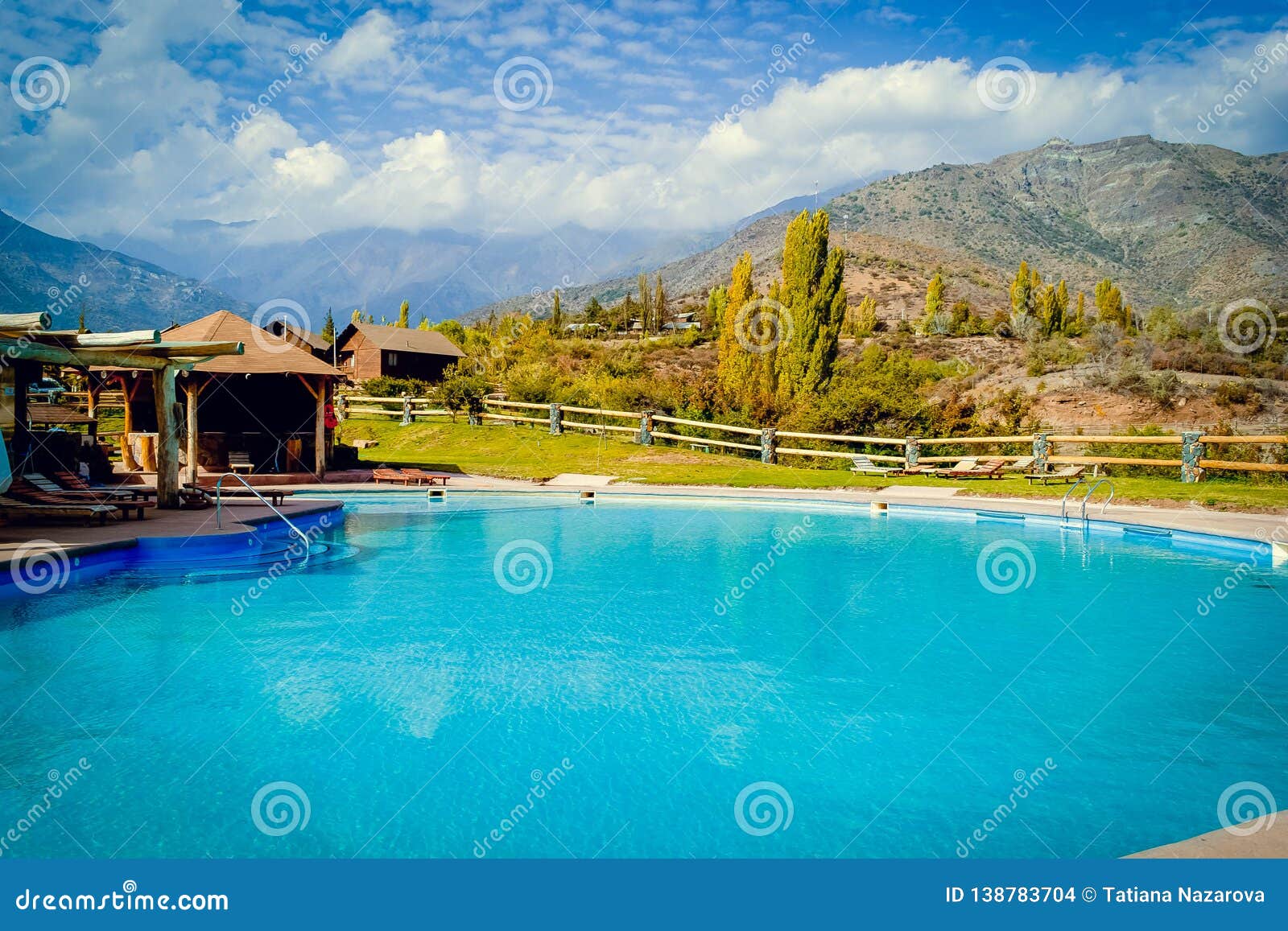 Open pool in the mountains stock photo. Image of grass - 138783704