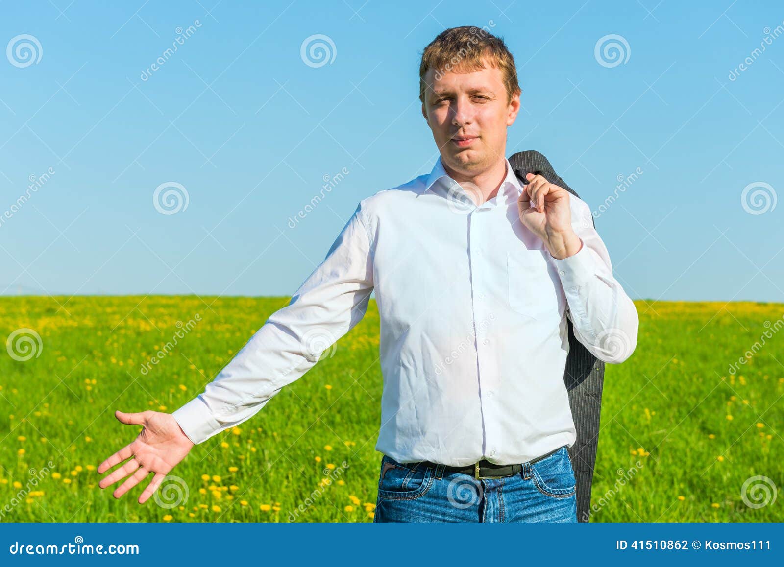 Open posture man in jeans stock photo. Image of green - 41510862