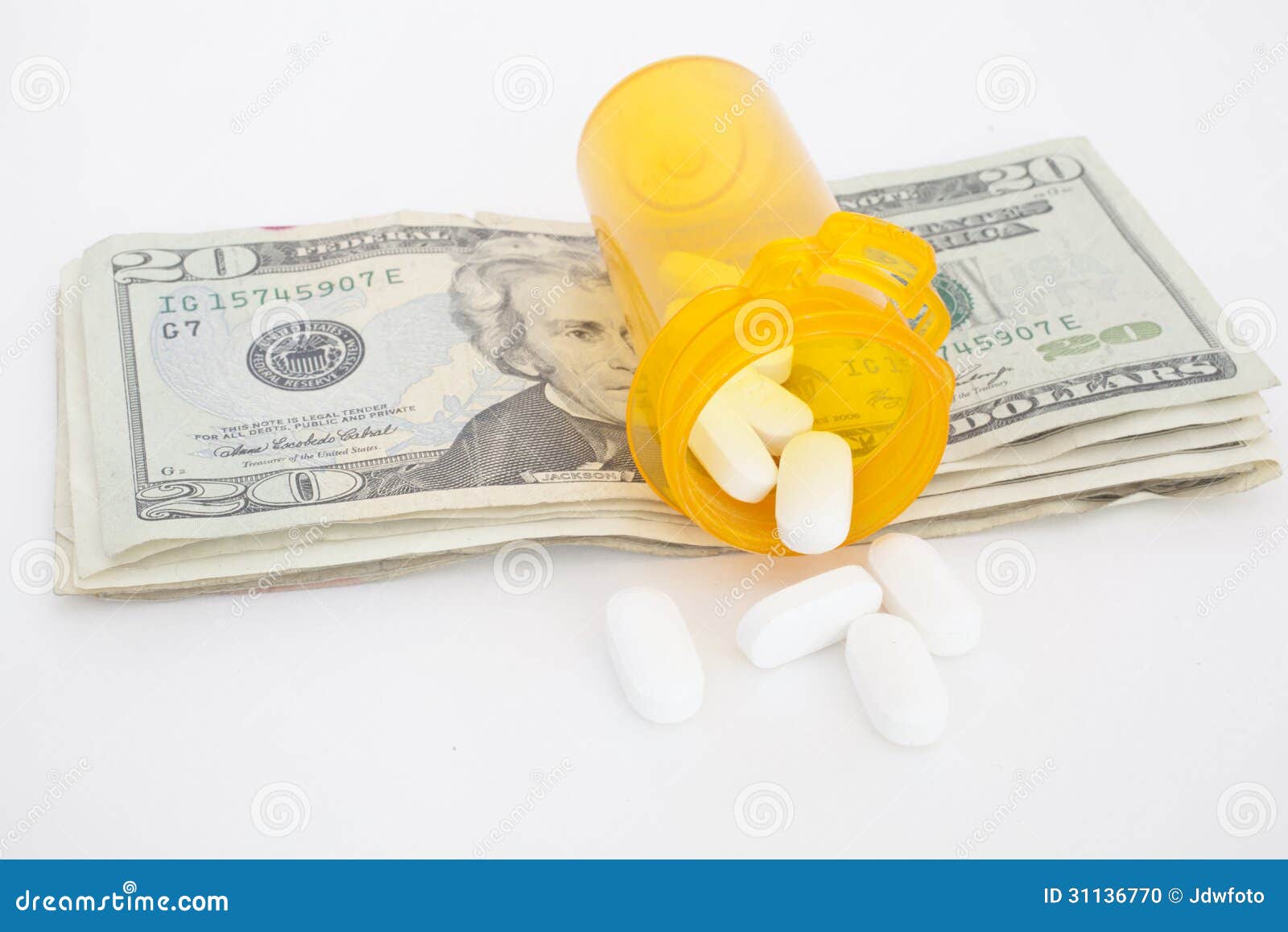 Open Prescription Pill Bottle on a Stack of Money Stock Photo - Image ...