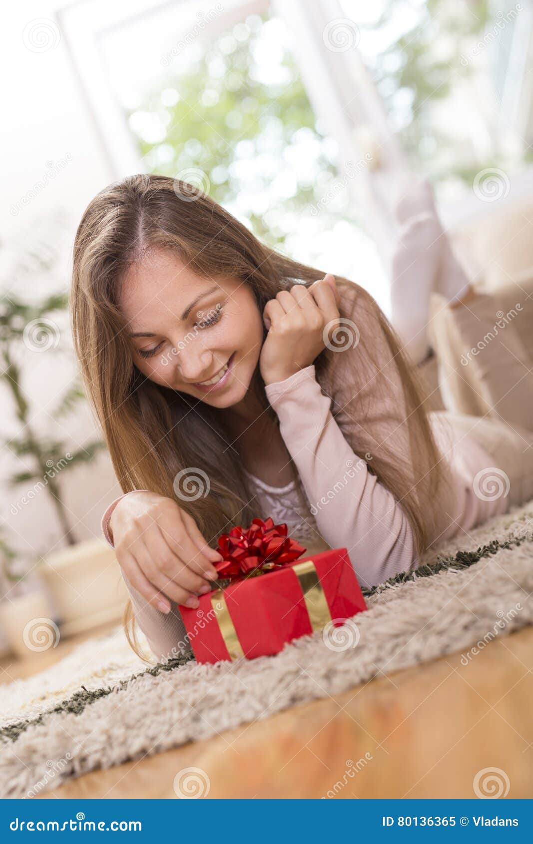 Open the present stock image. Image of carpet, birthday - 80136365