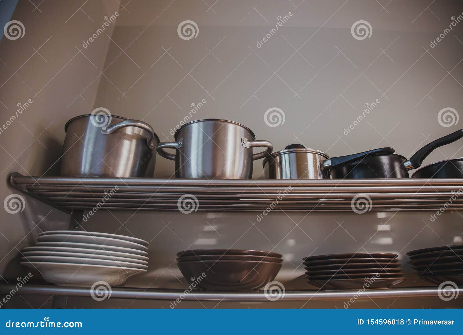 Open Racks with Dishes in the Kitchen Stock Photo - Image of interior ...