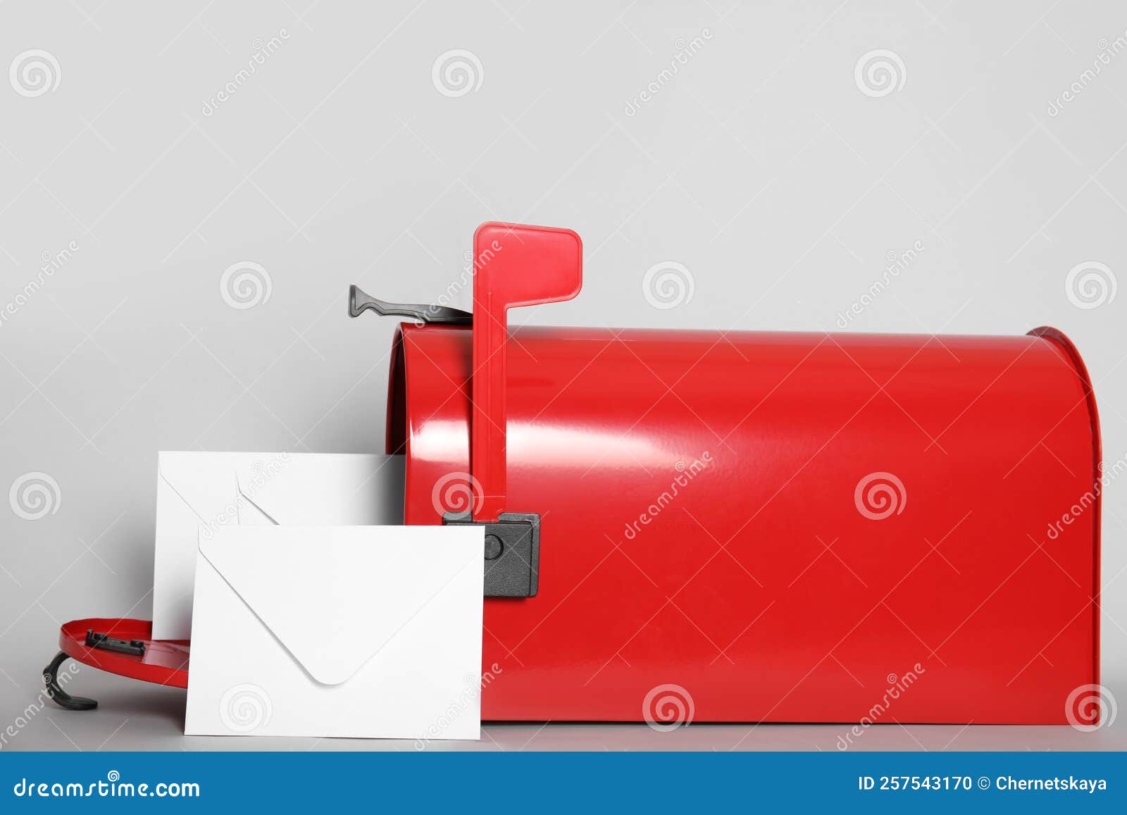 Open Red Letter Box with Envelopes on Light Background Stock Photo ...