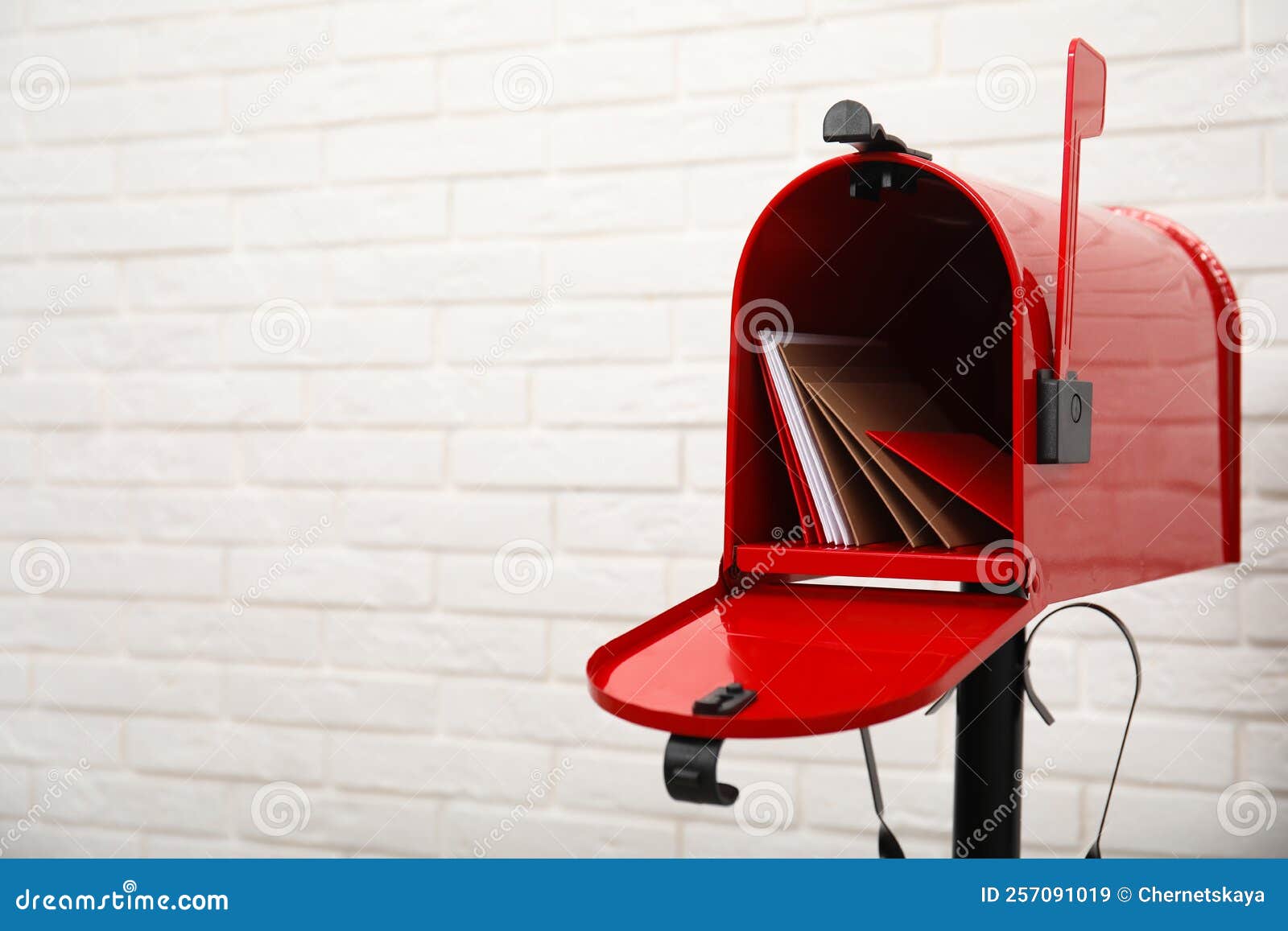 Open Red Letter Box with Envelopes Near White Brick Wall. Space for ...