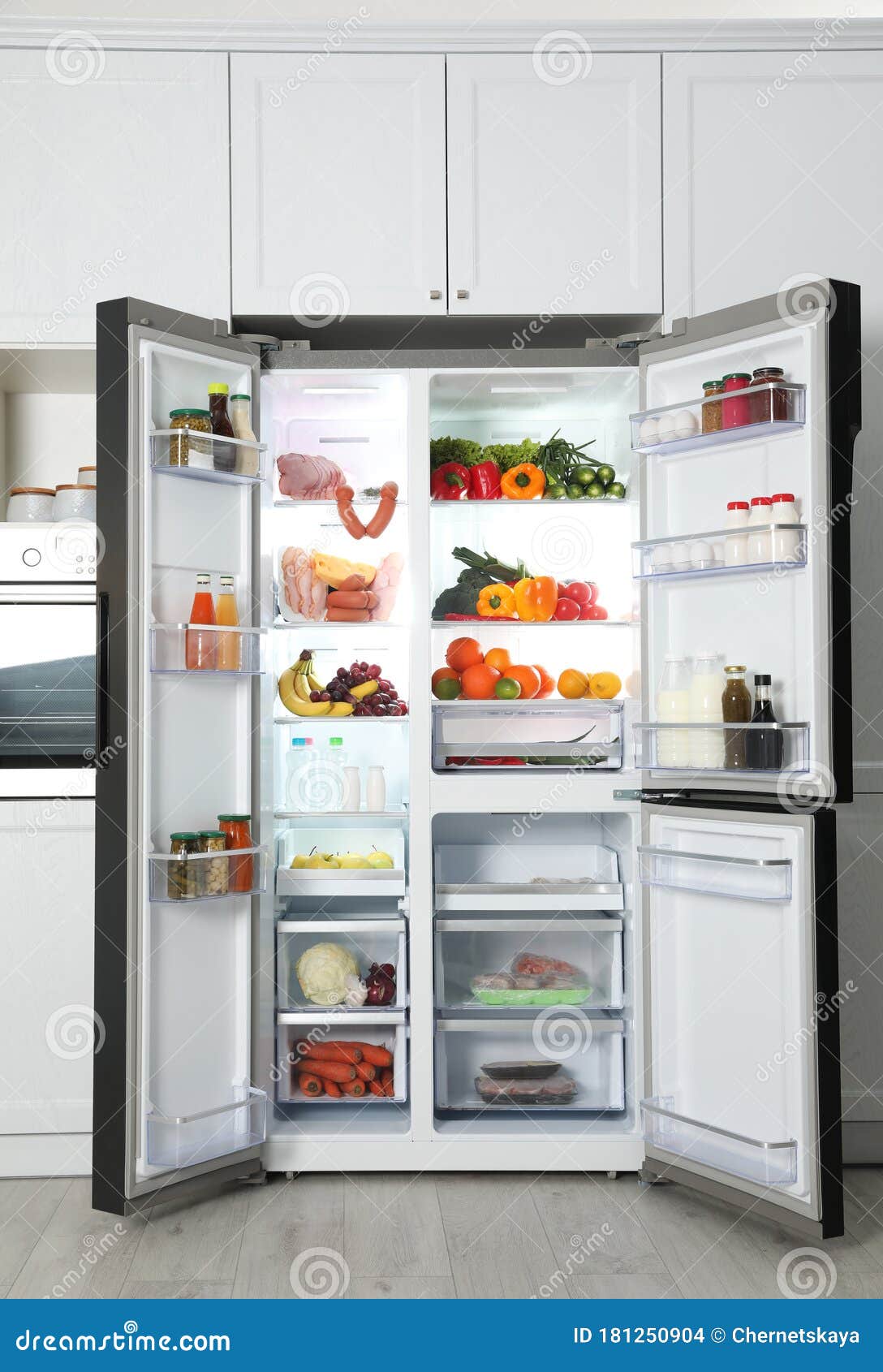 Open Refrigerator Filled with Food Stock Photo - Image of containers ...