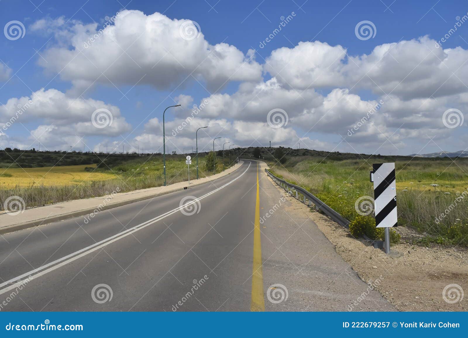 An Open Road through a Field Stock Image - Image of mountain, highway ...