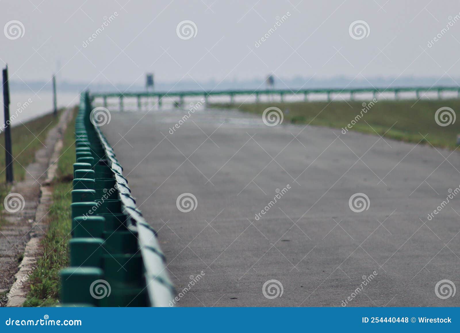 Open Road Surrounded with Green Barriers Stock Photo - Image of travel ...