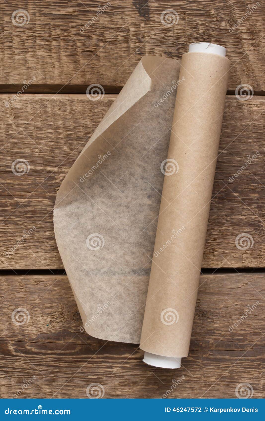 An Open Roll of Paper on the Wooden Table Background Stock Photo ...
