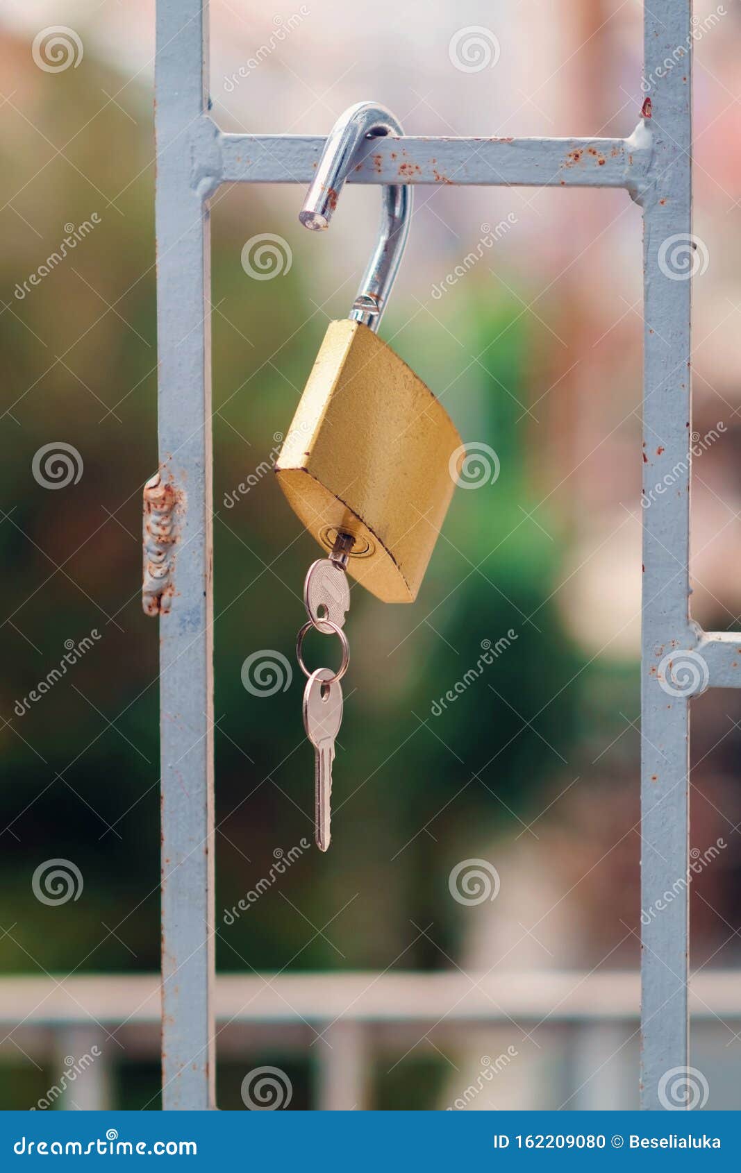 Open Lock with Keys Hanged on the Gate Stock Photo - Image of gate ...