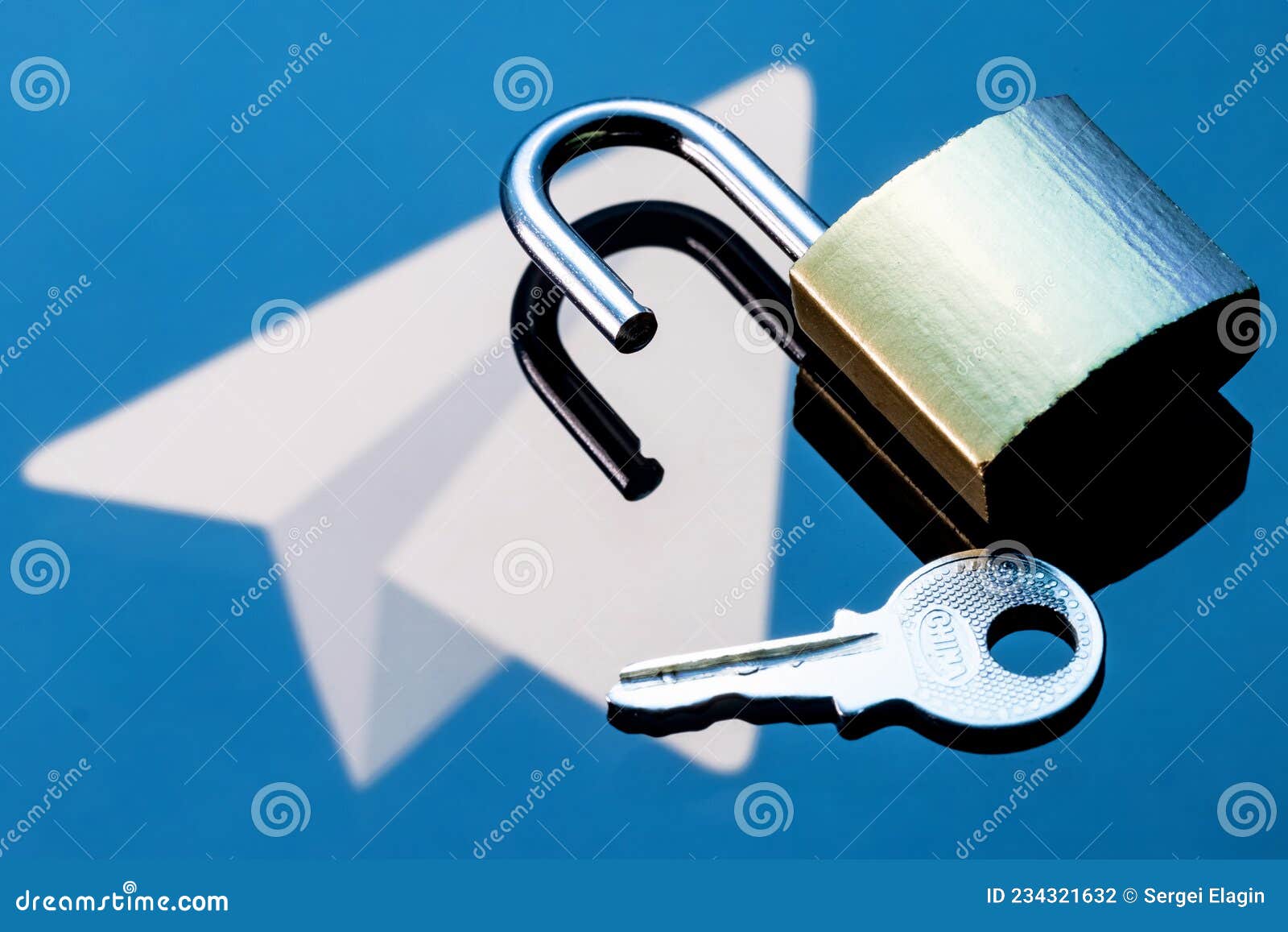 An Open Security Lock and Key on the Background of the Telegram ...