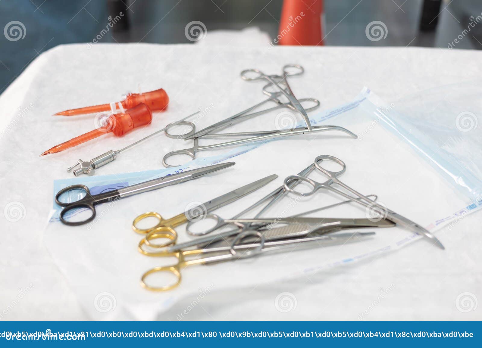 An Open Set of Sterile Surgical Instruments Lies on the Table in the ...