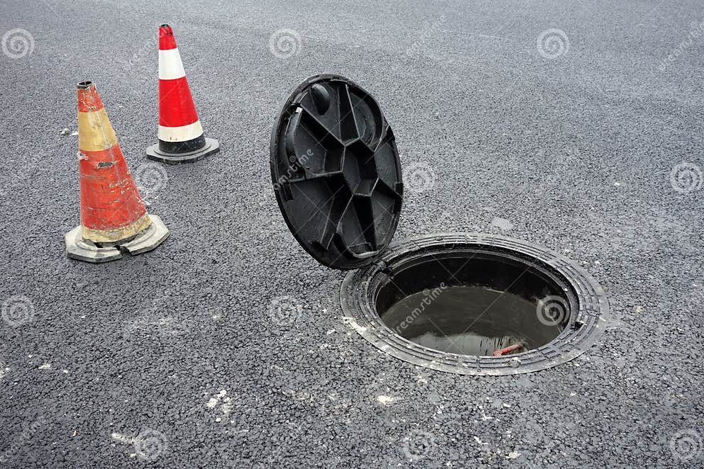 Open sewer manhole stock image. Image of care, holes - 31339503