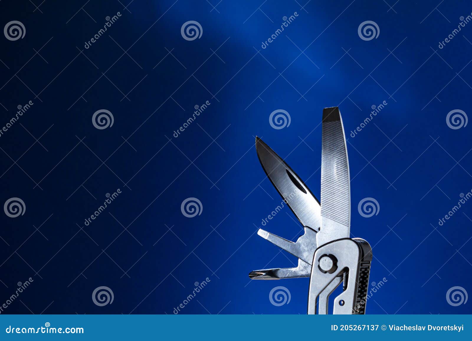 Open Source Multitool with Expanded Tools. Multitools Steel on Blue ...