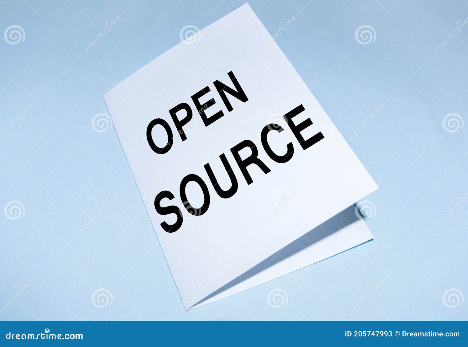 Open Source Text on a White Sheet on a Blue Background. a Concept Photo ...