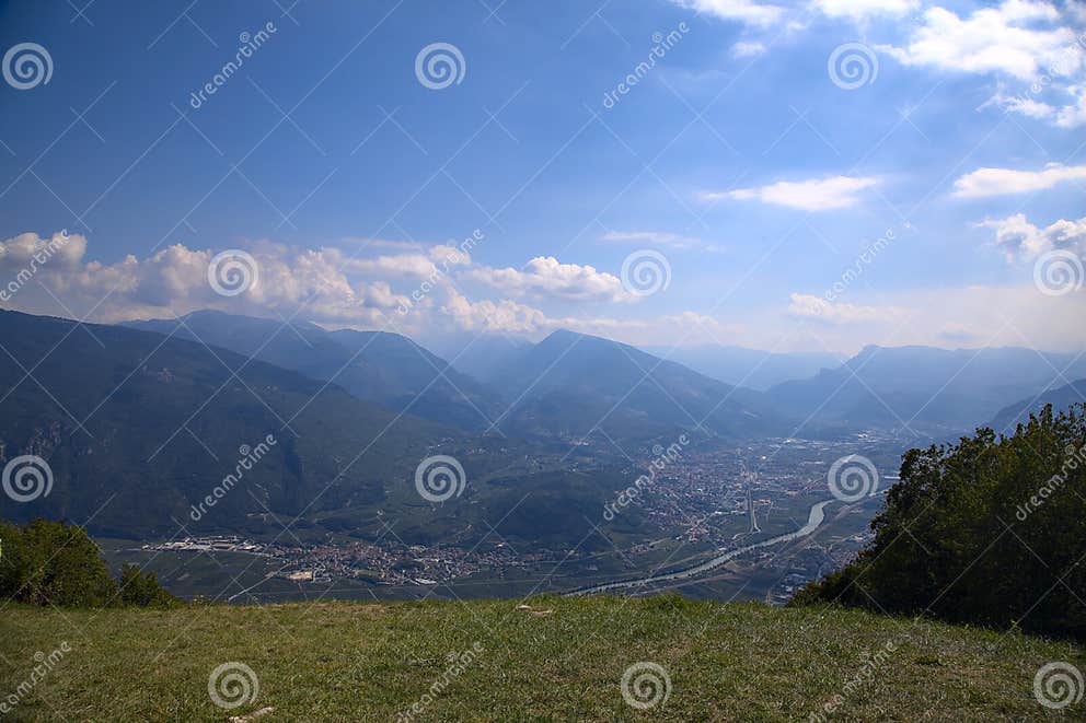 Open Space in the Mountains with Mountain Range and a Town in the ...