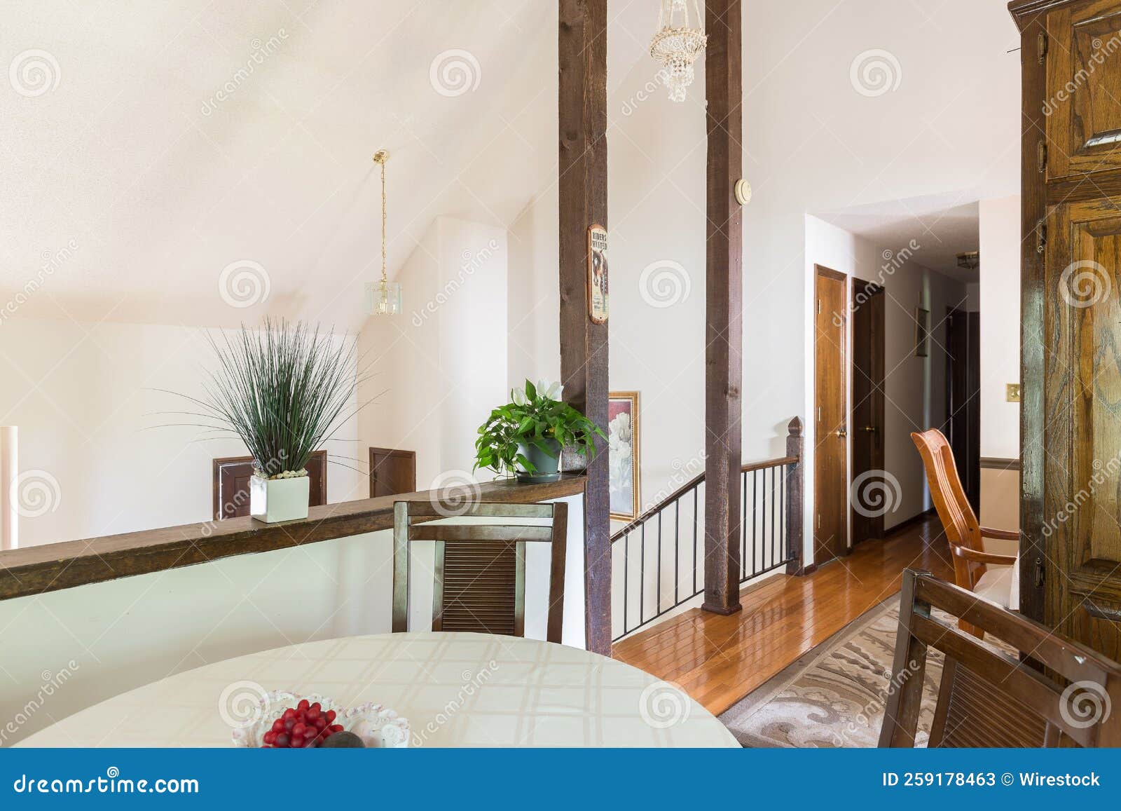 Open Space on the Second Floor of the House with Wooden Details and a ...