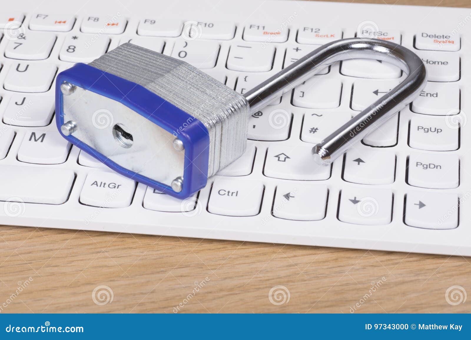 Open Steel Padlock Lying on a Computer Keyboard Stock Photo - Image of ...
