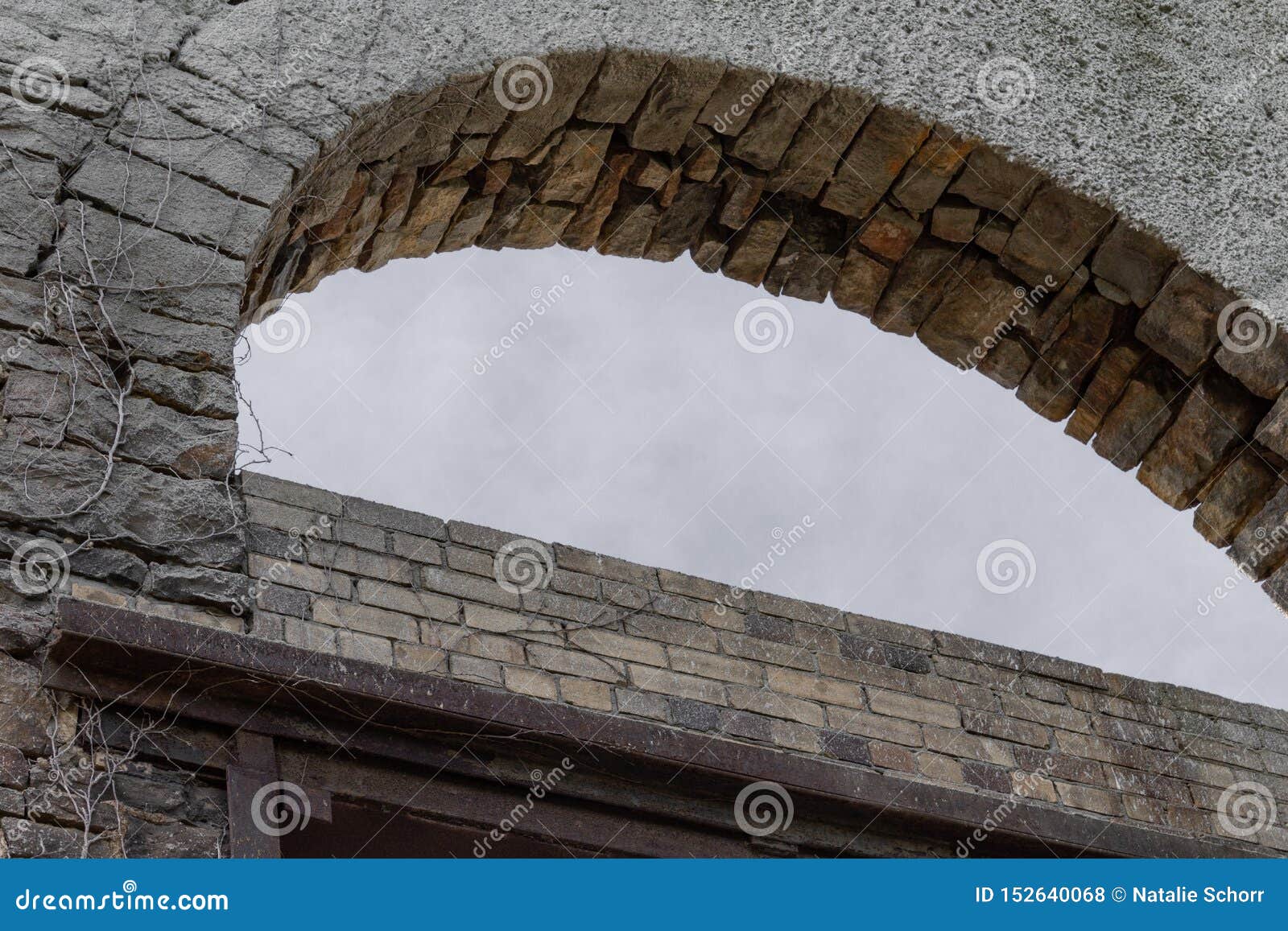 Open Stone and Brick Archway with Gray Clouds Behind, Creative Copy ...