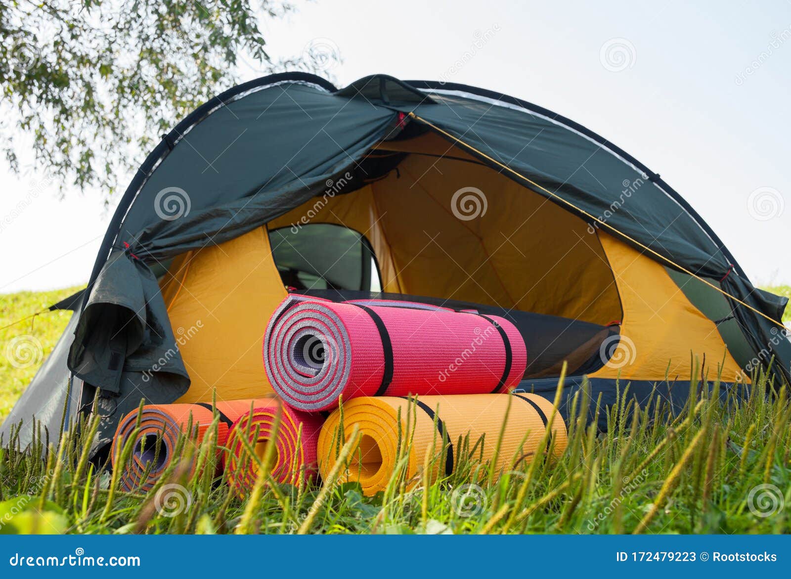 Open Tent and Rolled Sleeping Pads Stock Image - Image of bonfire ...