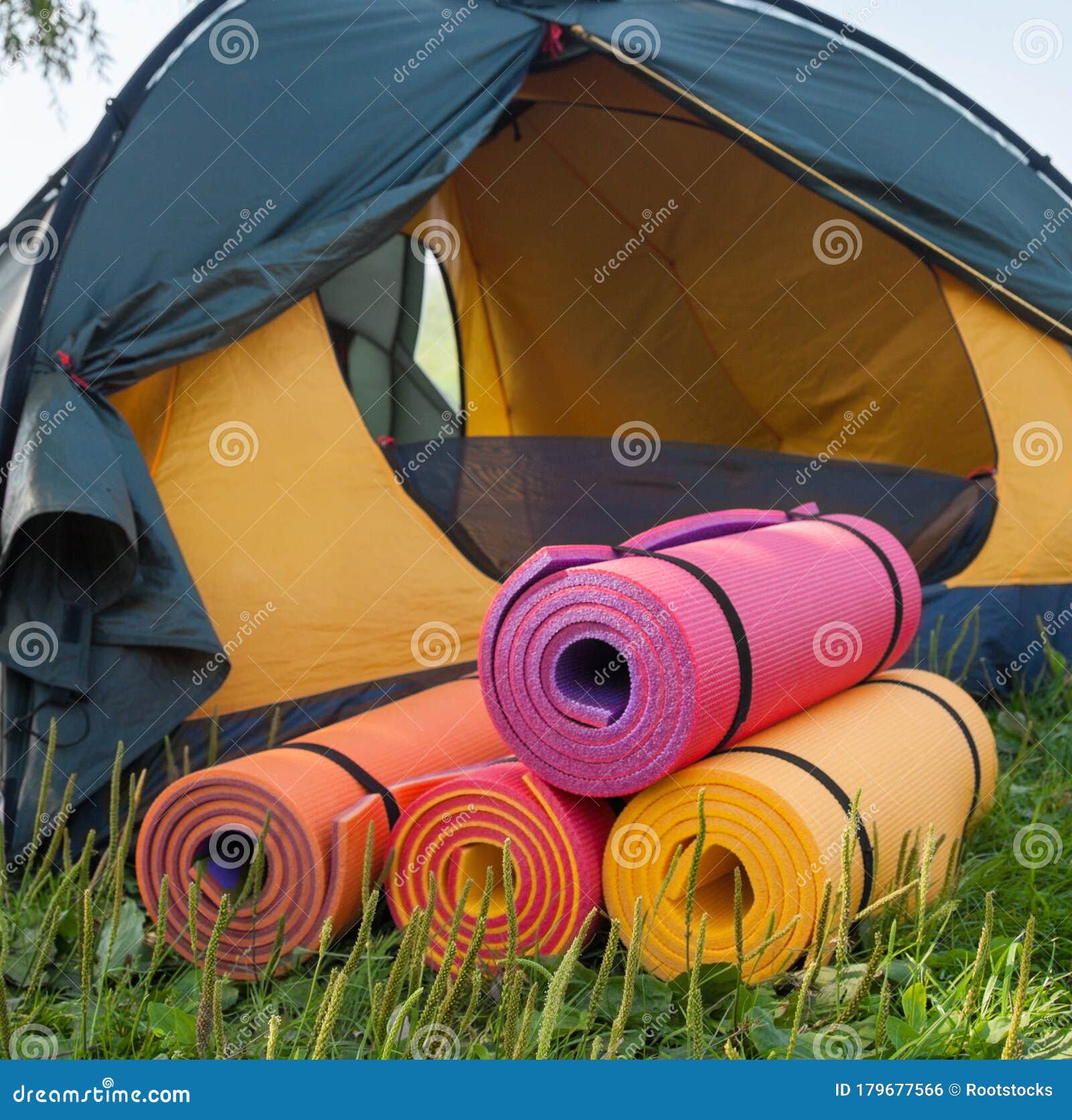 Open Tent and Rolled Sleeping Pads Stock Photo - Image of nature ...
