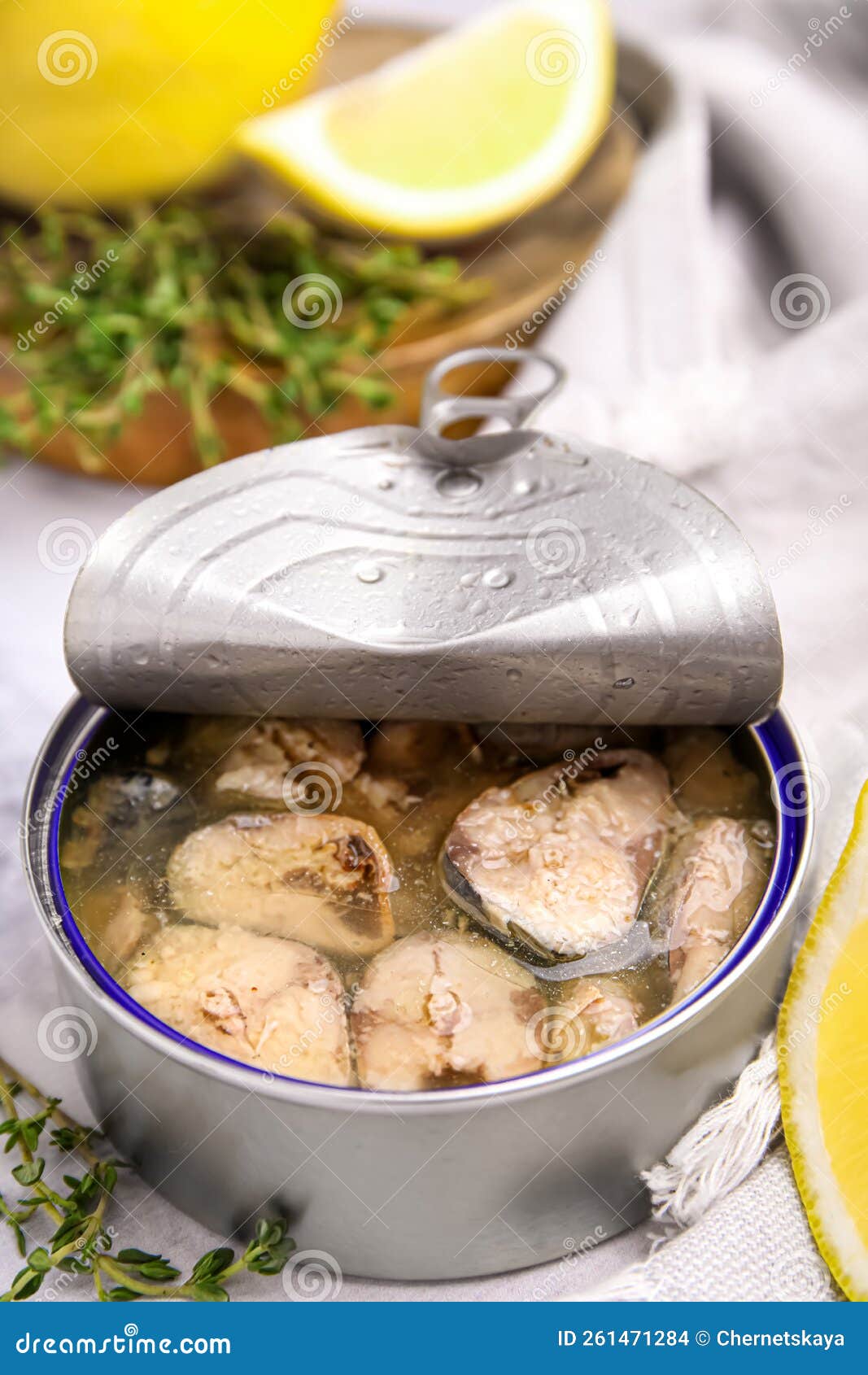 Open Tin Can with Mackerel Chunks on White Marble Table, Closeup Stock ...