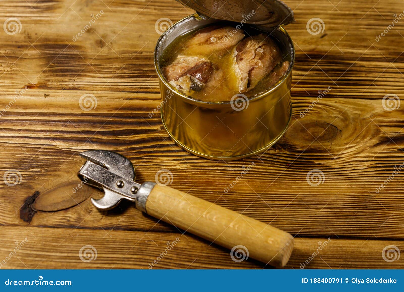 Open Tin Can of Sardine Fish and Can Opener on Wooden Table Stock Image ...