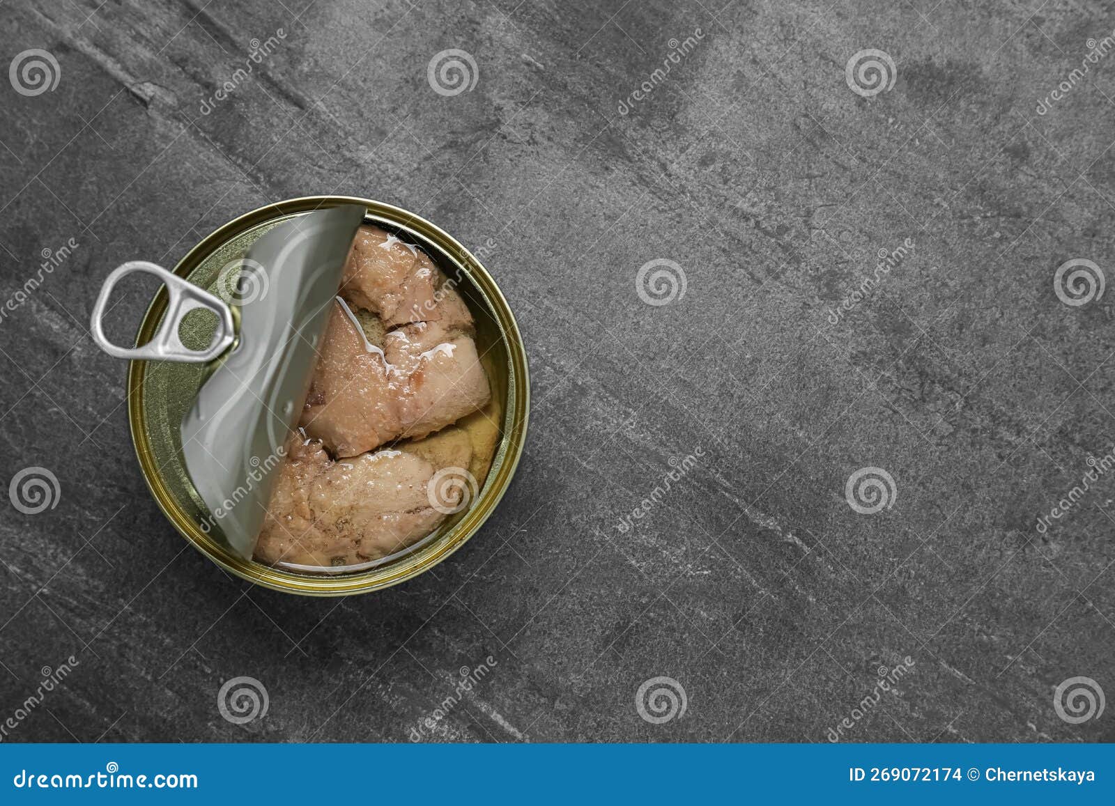 Open Tin Can of Tasty Cod Liver on Black Table, Top View. Space for ...