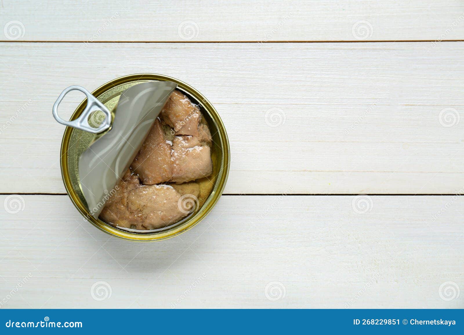 Open Tin Can of Tasty Cod Liver on White Wooden Table, Top View. Space ...