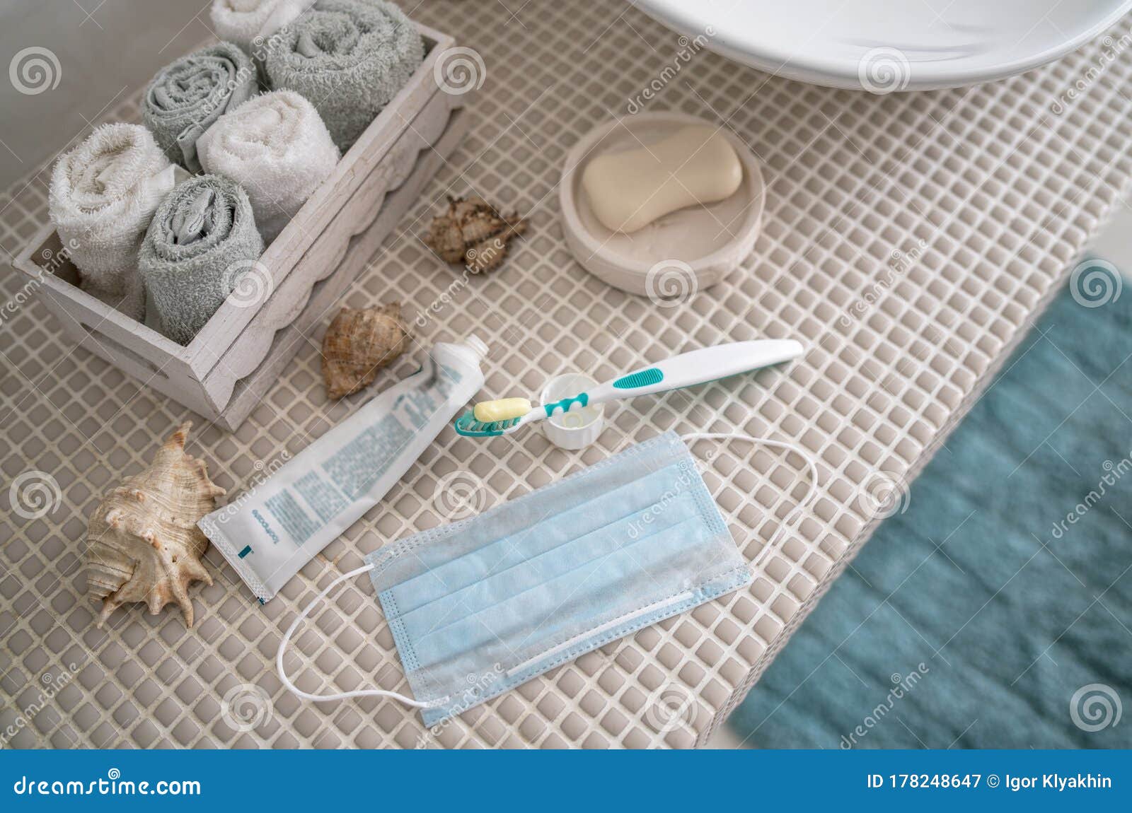 Open Toothpaste, a Toothbrush, and a Medical Mask that Has Been Removed ...