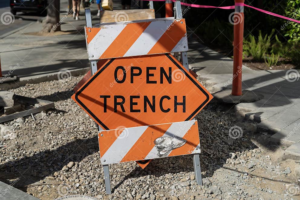 Open Trench Sign on a Sidewalk Stock Image - Image of vehicle, wood ...