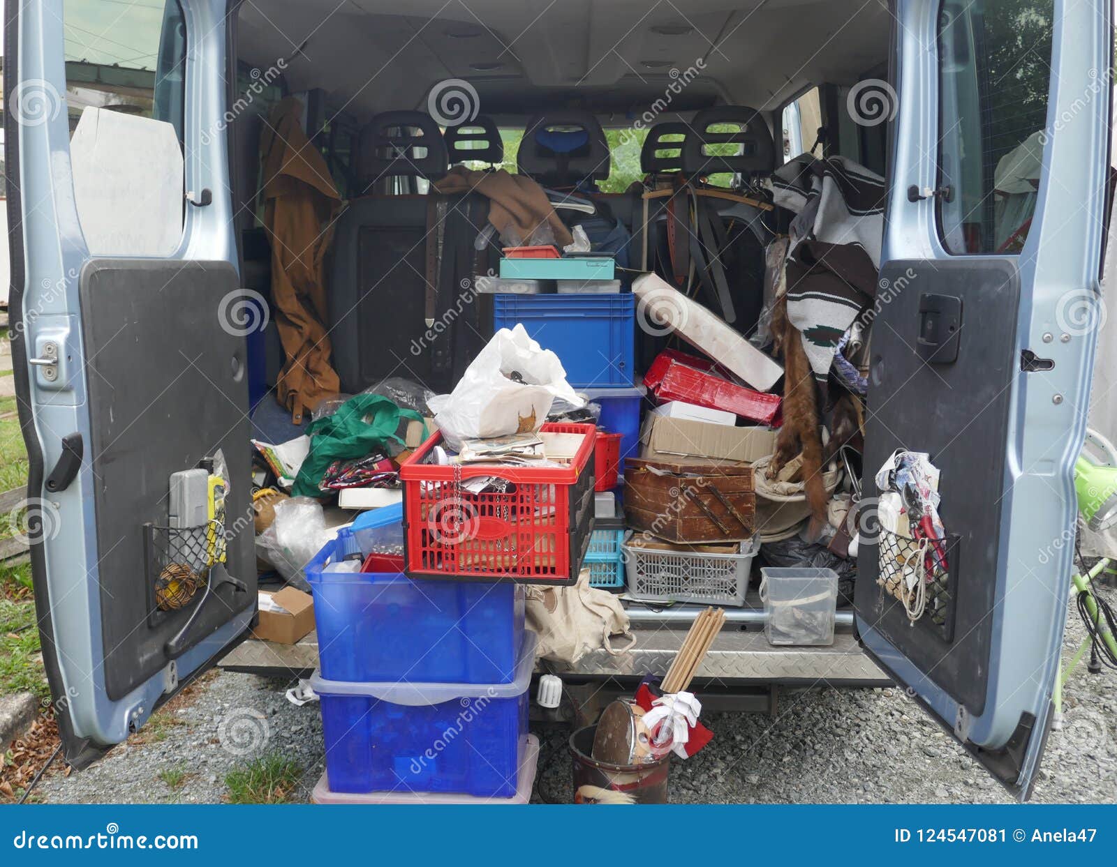 Open, Untidy Trunk of a Delivery Van, Loaded with Old Tools, Scrap and ...