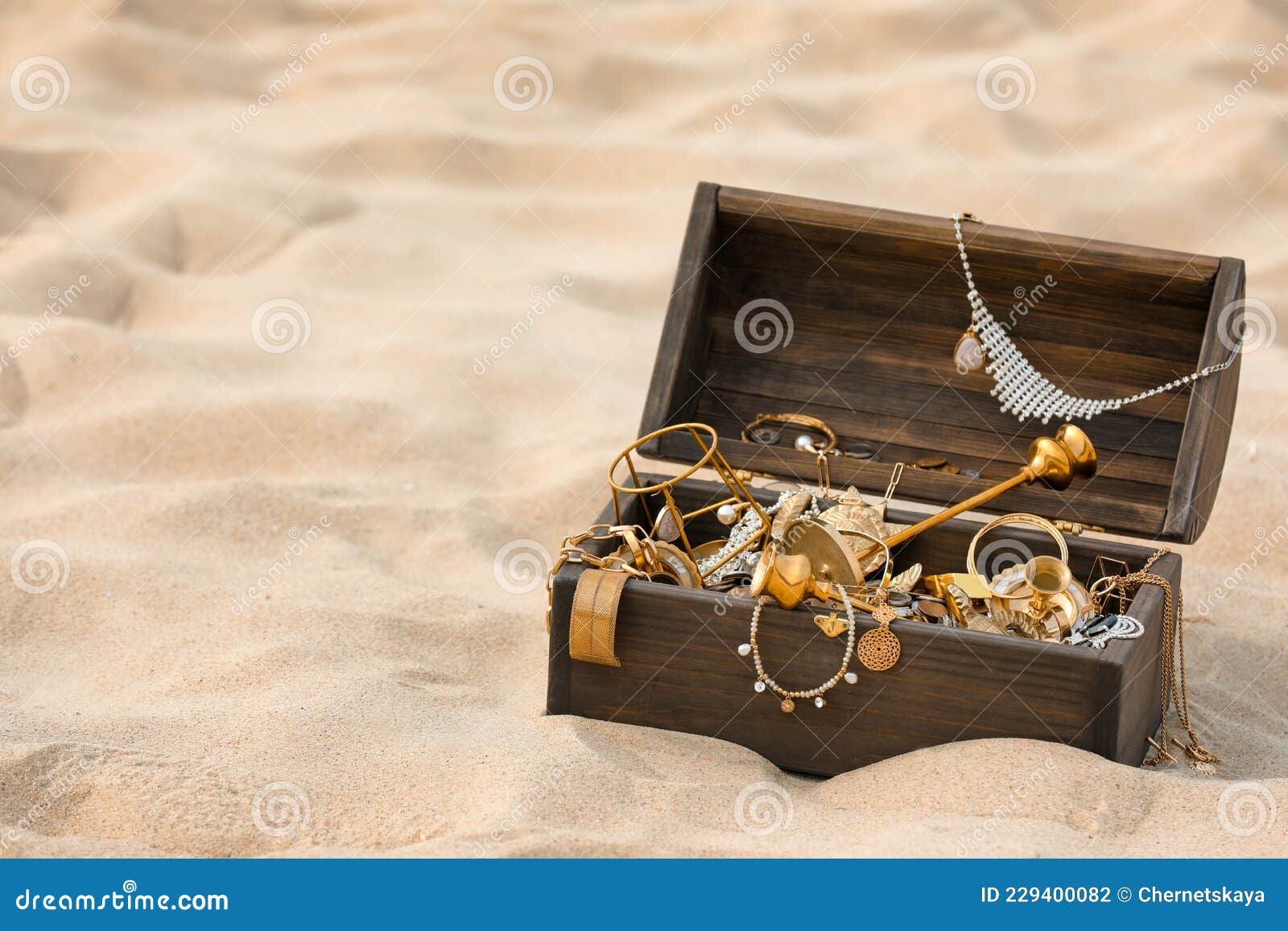 Open Wooden Treasure Chest on Sand, Space for Text Stock Photo - Image ...