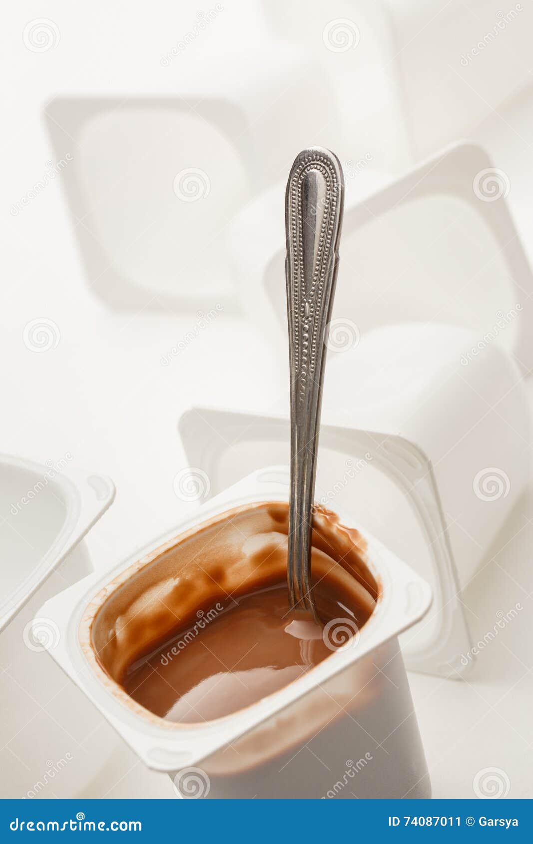 Open Yogurt in Pot with Metal Spoon Stock Image - Image of container ...