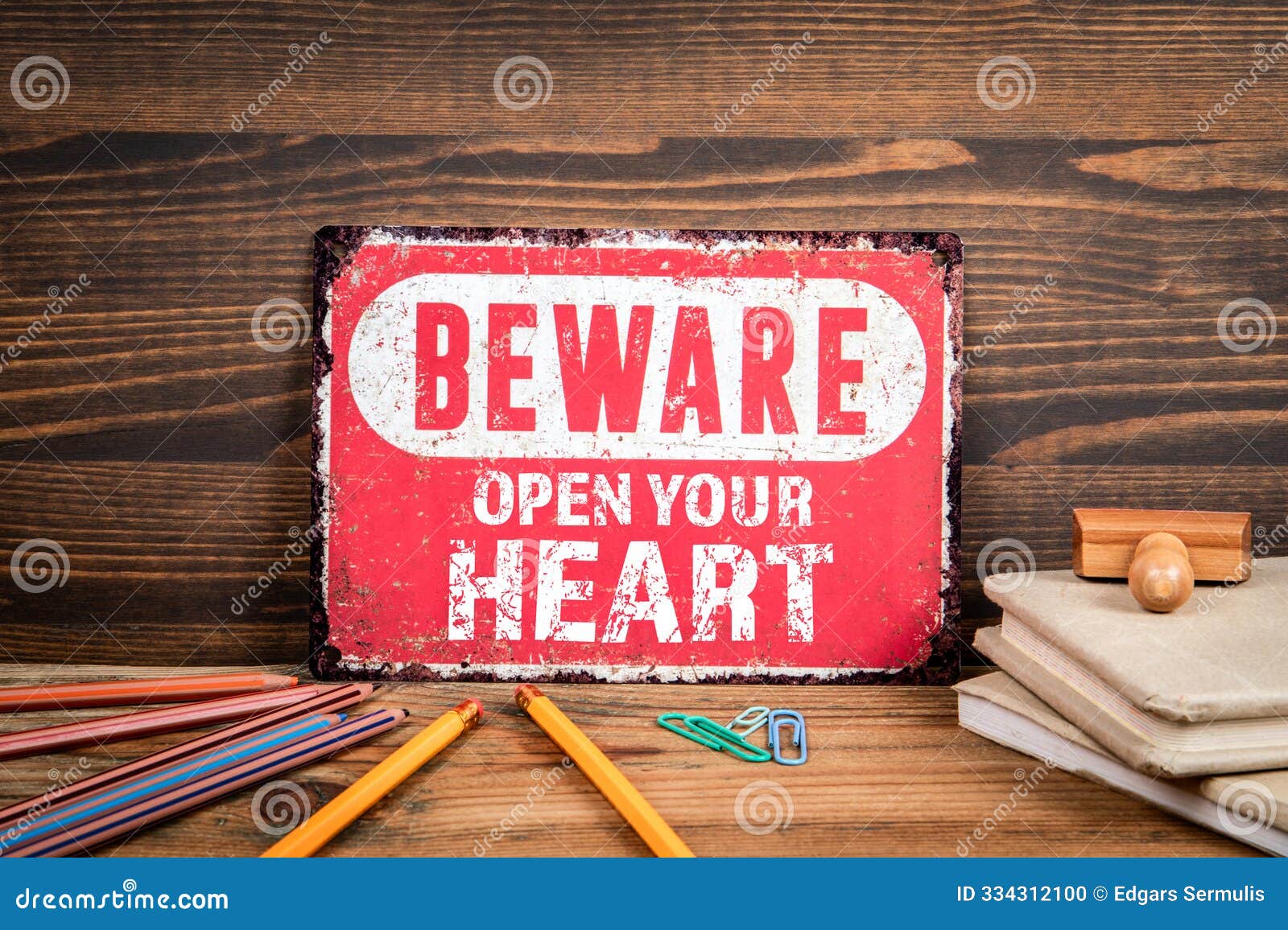 Open Your Heart. Beware Sign with Text on a Wooden Texture Office Table ...