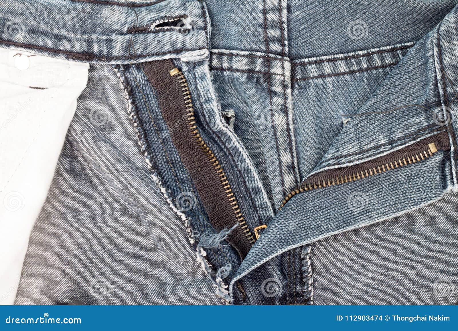 Open zipper on jeans stock photo. Image of decoration - 112903474
