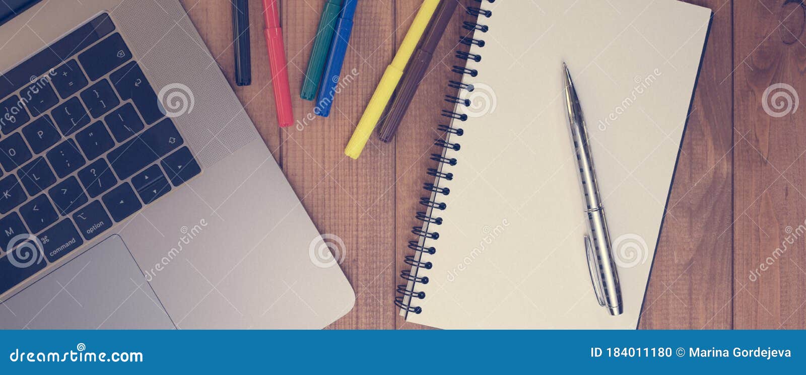 Opened Blank Notebook, Laptop and Colored Felt-tip Pens on the Desktop ...