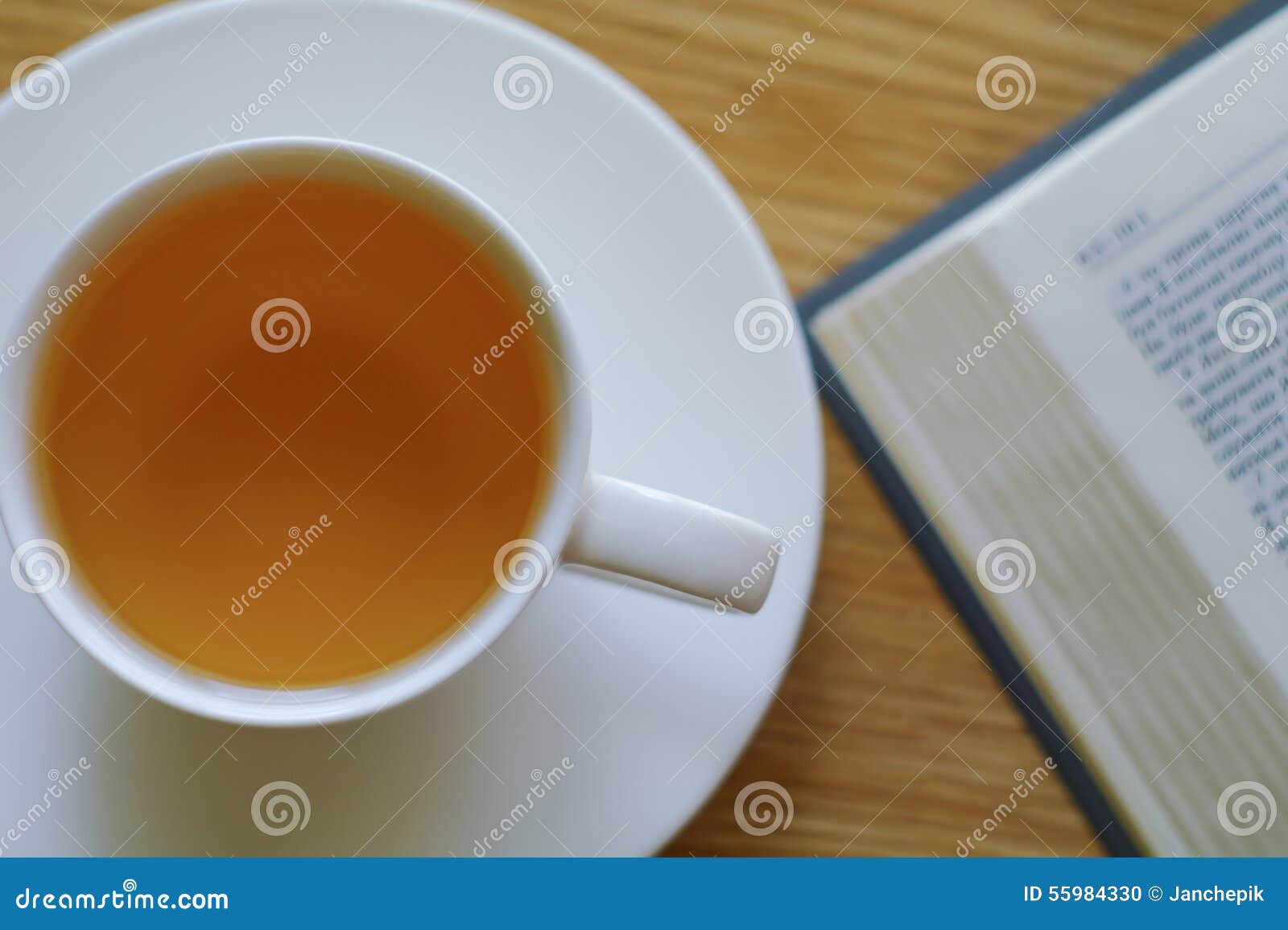 Opened Book and Cup with Tea. Stock Photo - Image of brown, indoors ...