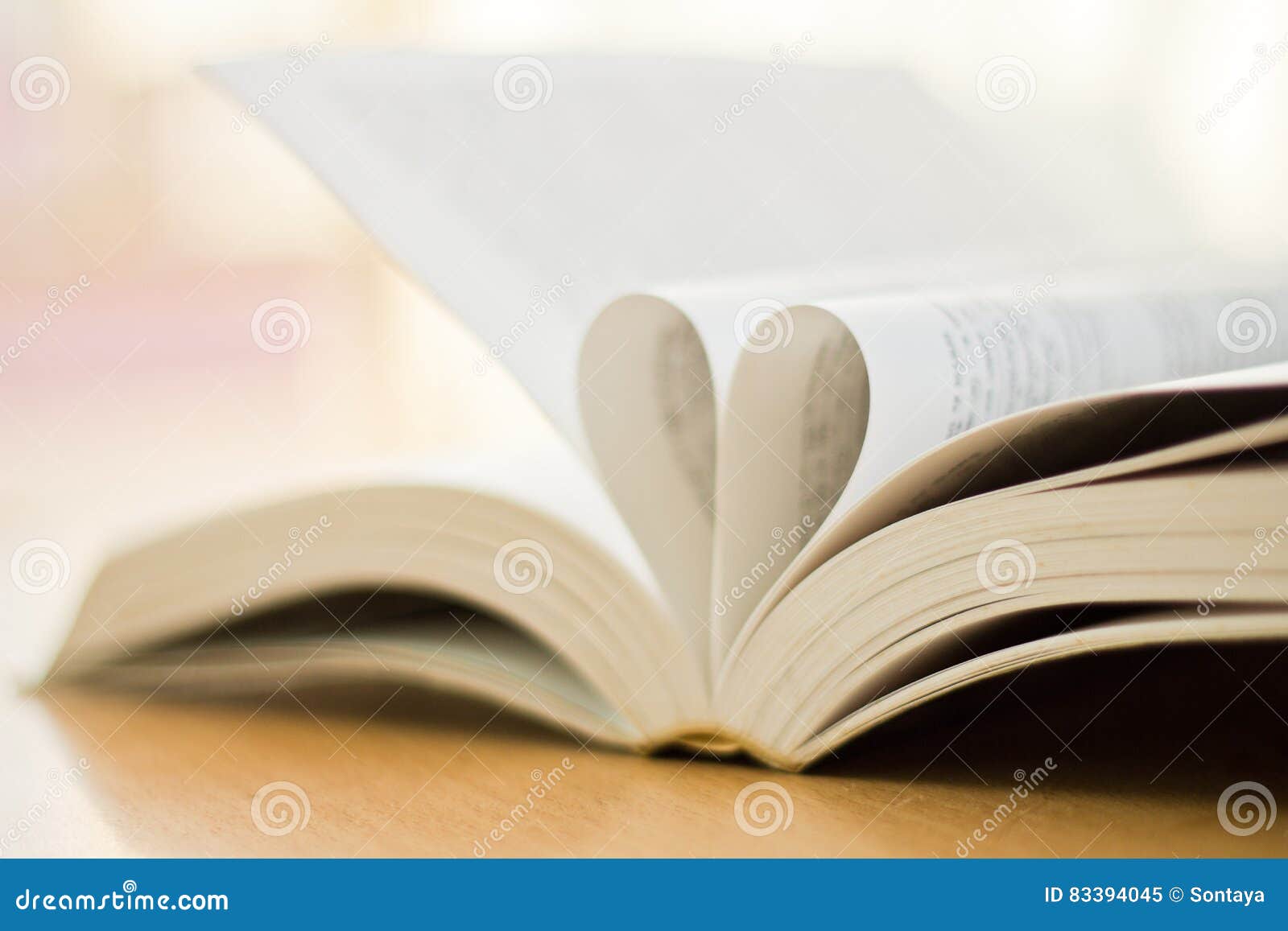 Opened book heart shaped stock image. Image of love, library - 83394045