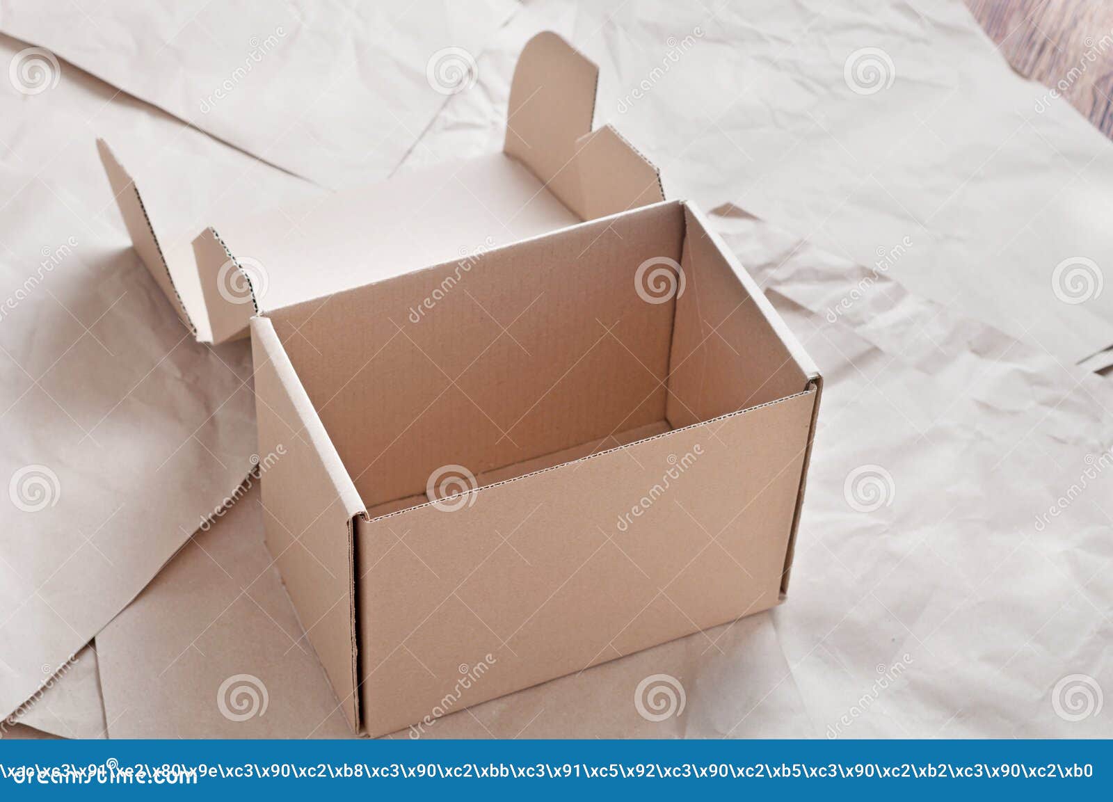 Brown Carton Box Laying on Sheets of Crumpled Kraft Paper Stock Image ... Brown Carton Box Laying on Sheets of Crumpled Kraft Paper Stock Image ...