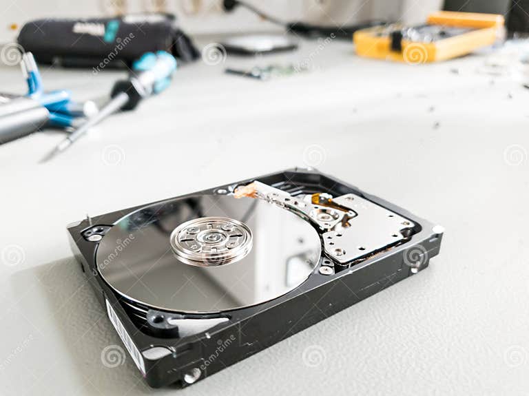 Opened Computer Hard Drive on a Table Prepared To Be Fixed. Stock Photo ...