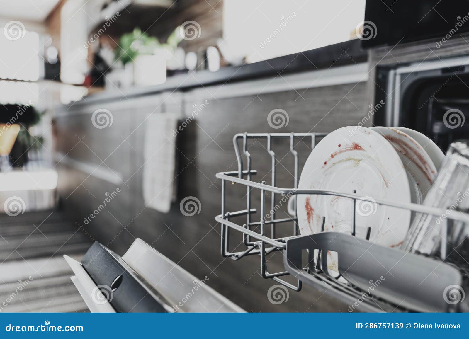 Opened Dishwasher Machine at Kitchen with Dirty Utensil after Dinner or ...