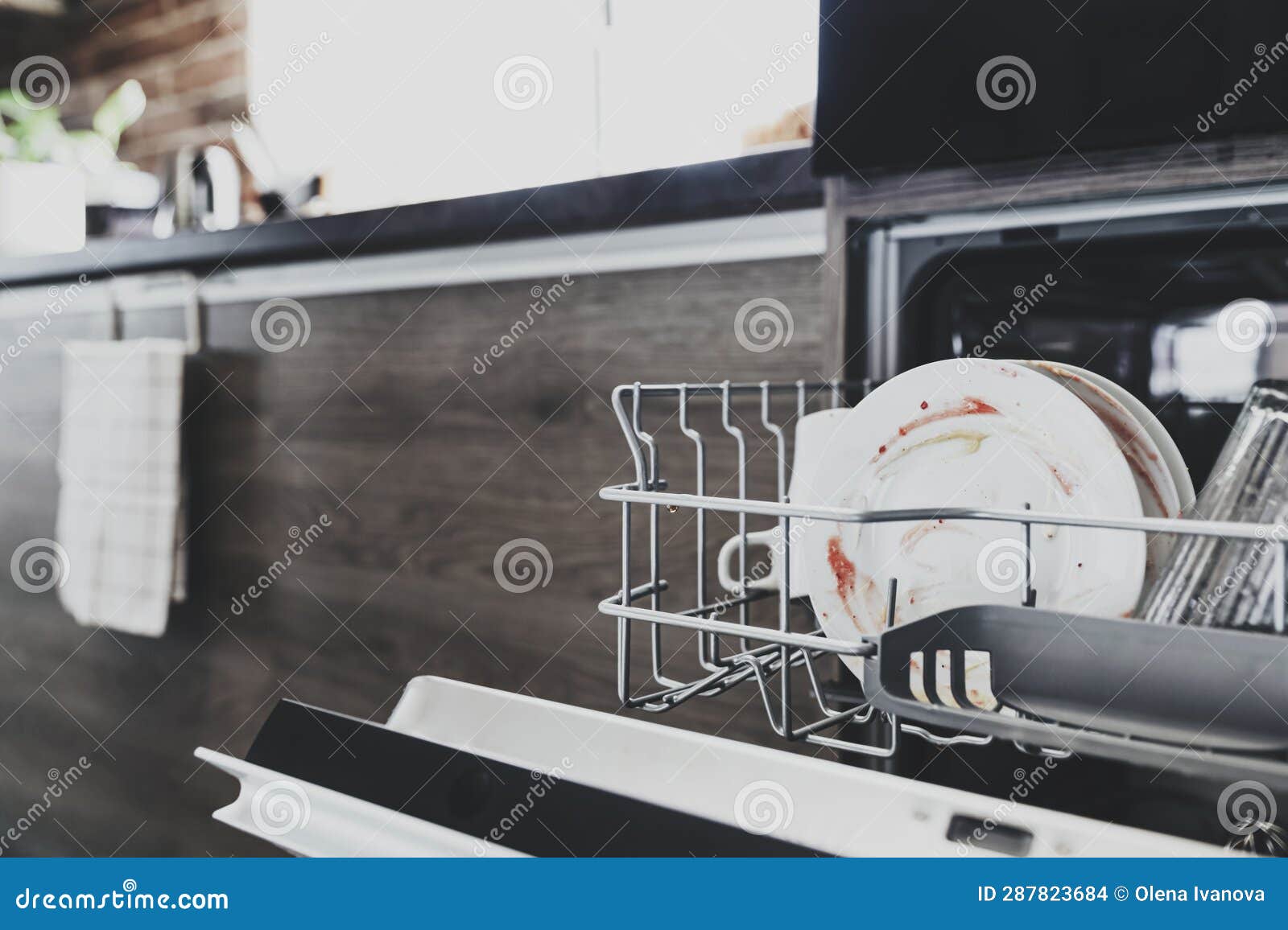 Opened Dishwasher Machine at Kitchen with Dirty Utensil after Dinner or ...