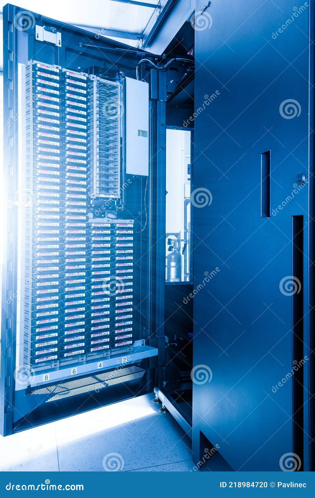An Opened Door of Data Center Cabinet Filled with Data Storage H Stock ...